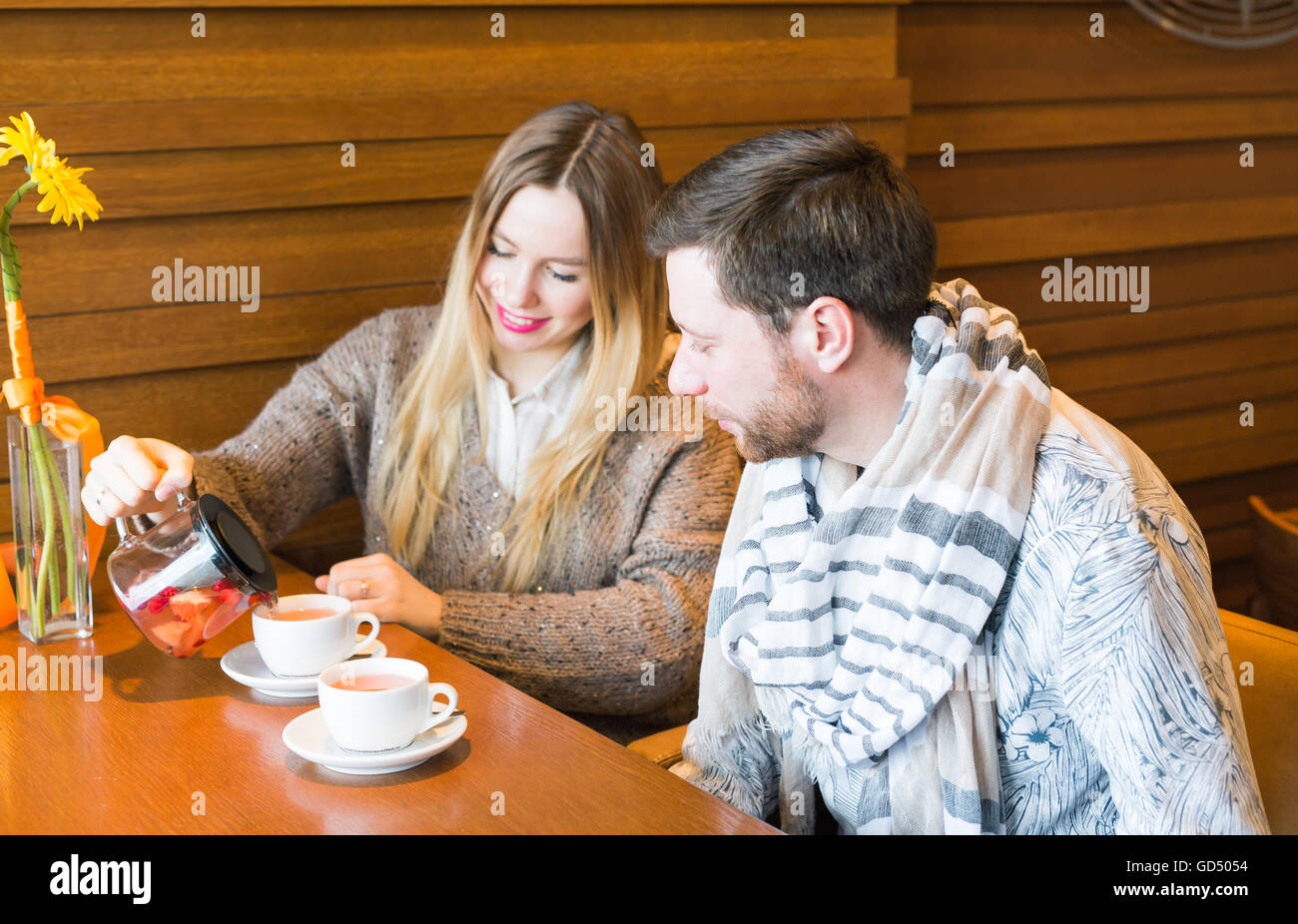Couple having tea together Stock Photo - Alamy