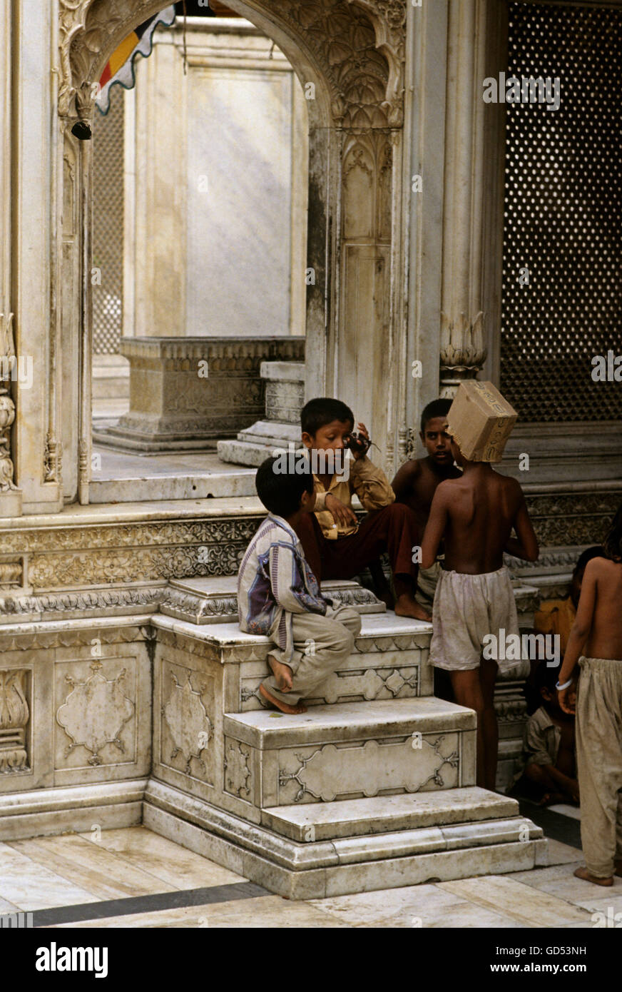 Children playing at tomb Stock Photo - Alamy