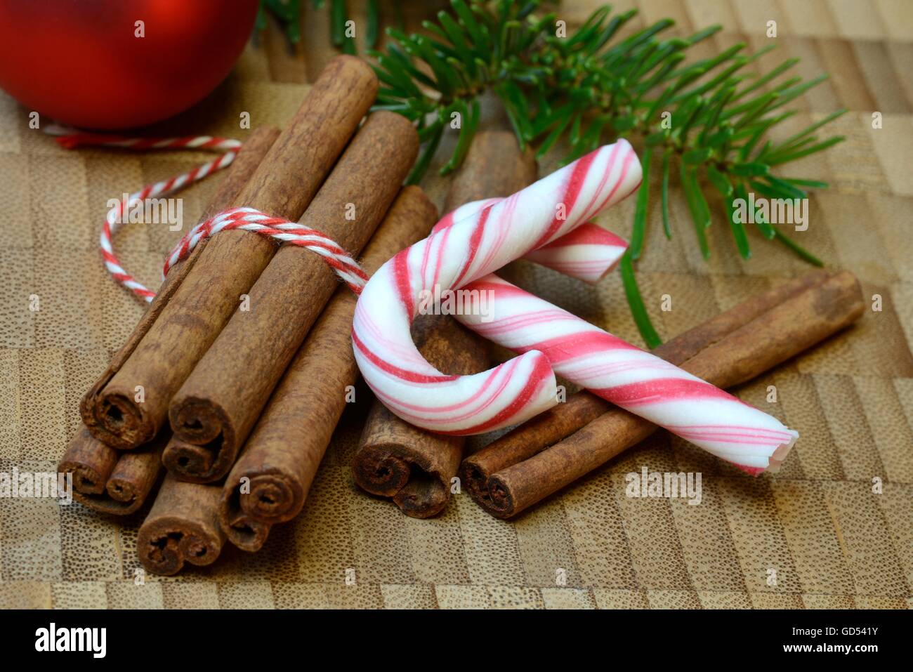 Spices and candy canes Stock Photo - Alamy