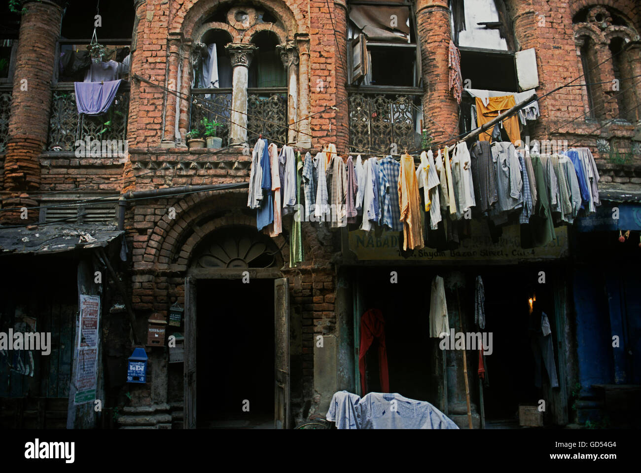 Clothes hung on the wire for drying Stock Photo - Alamy