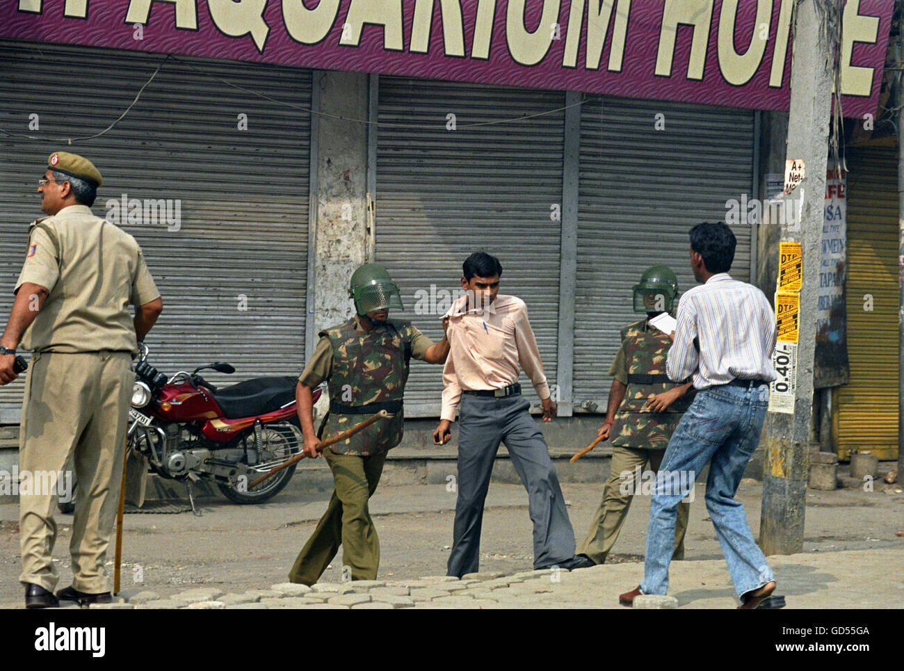 Man With Lathi High Resolution Stock Photography and Images - Alamy
