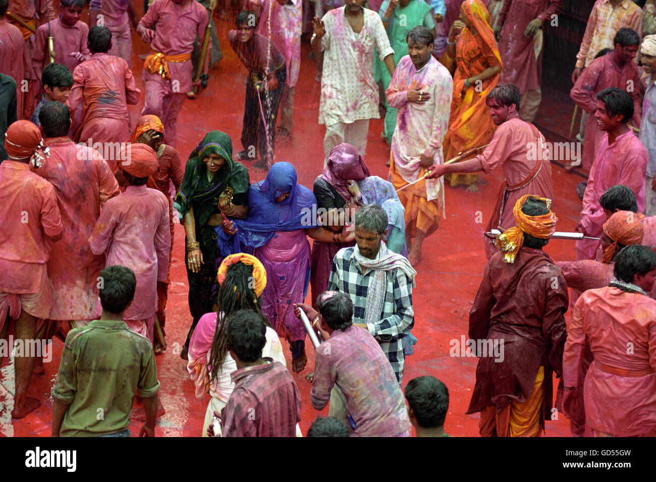 People playing holi Stock Photo - Alamy