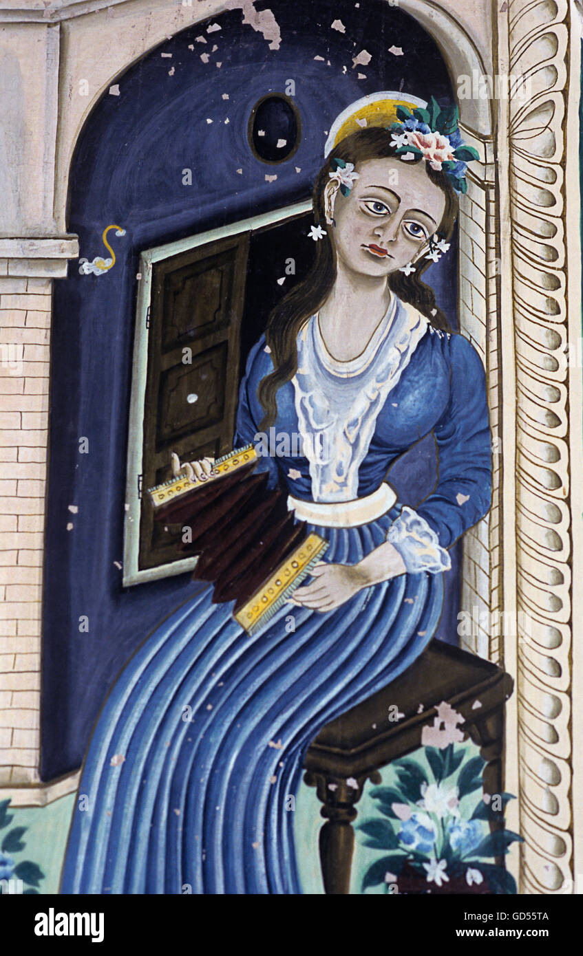 Mural of a woman playing a concertina Stock Photo - Alamy