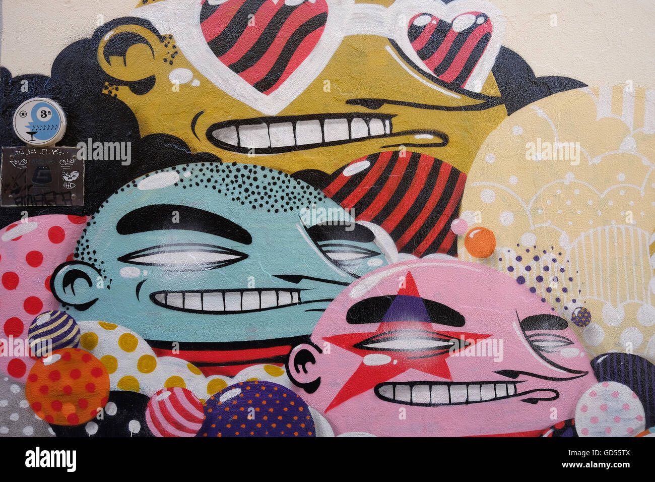 Graffiti street art colourful heads and faces with white teeth Lisbon ...