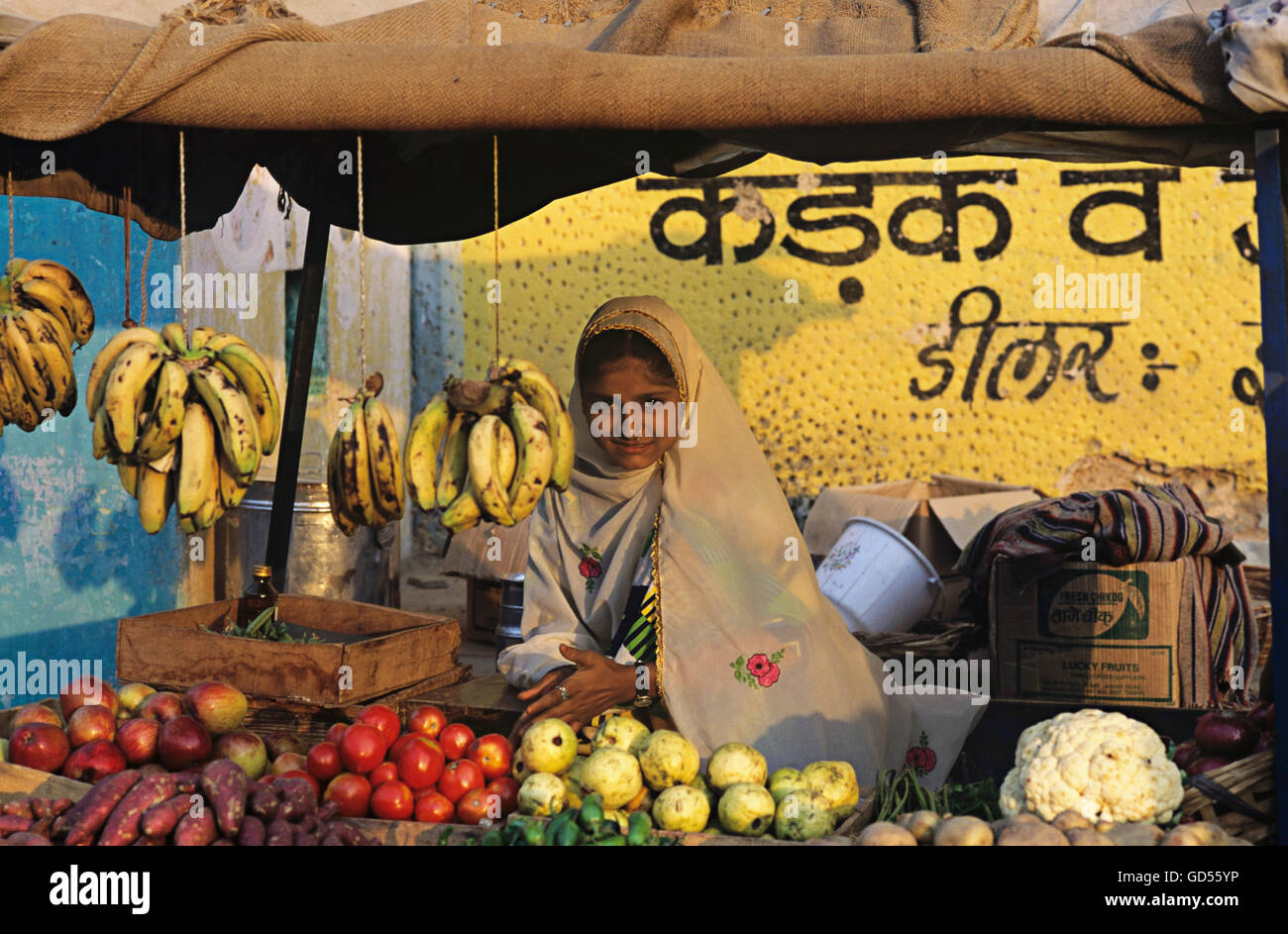 A roadside vendor selling fruits Stock Photo - Alamy