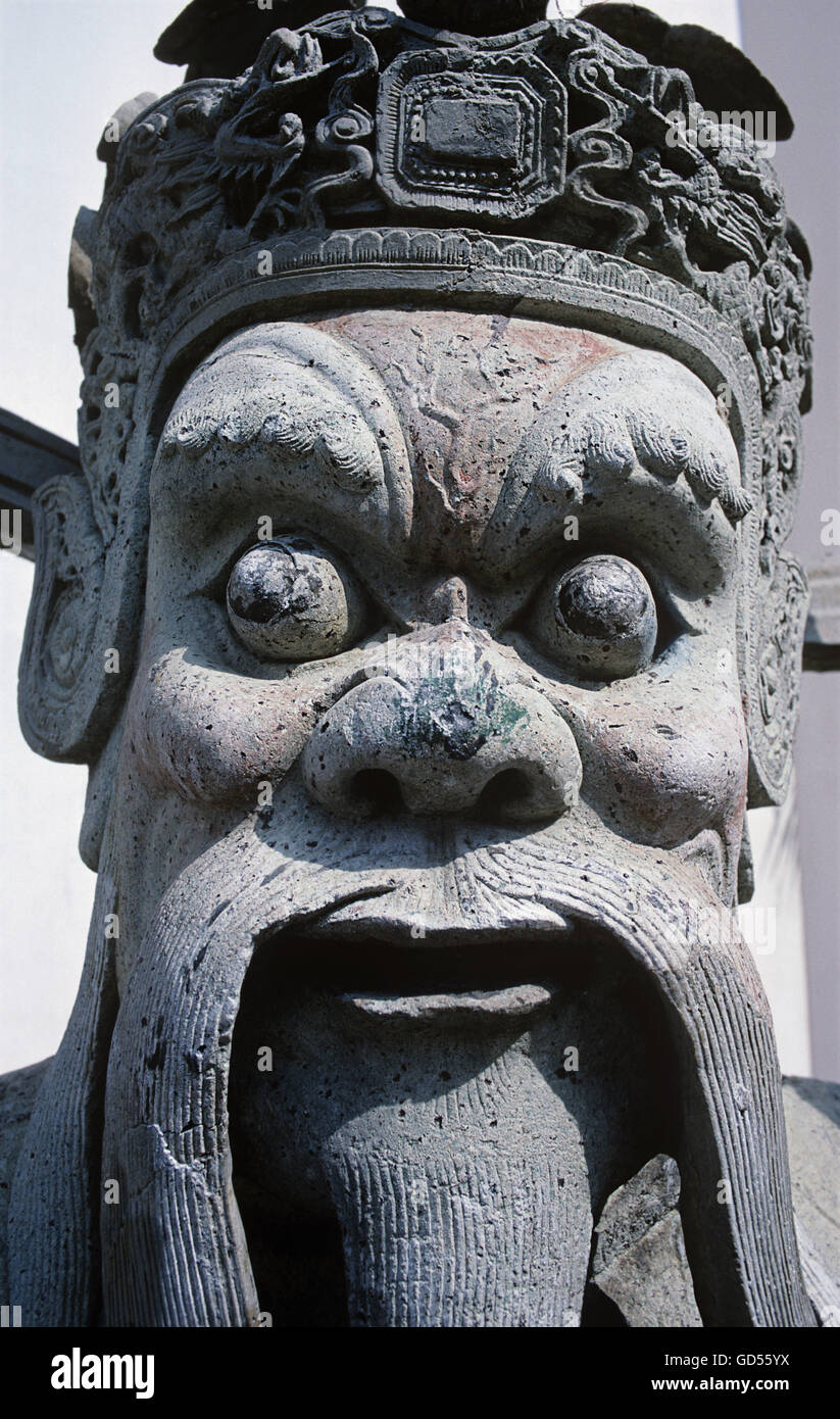 Face of a Chinese stone statue Stock Photo - Alamy