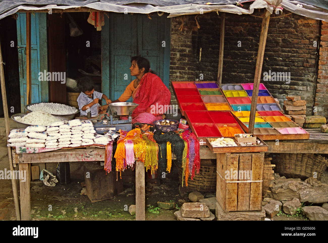 A woman selling colours Stock Photo - Alamy