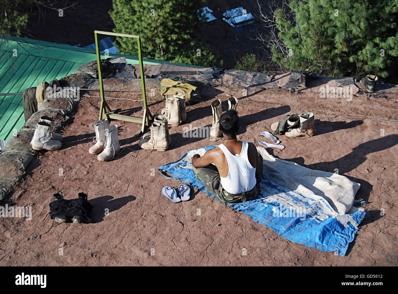 Soldier basking in the sun Stock Photo - Alamy