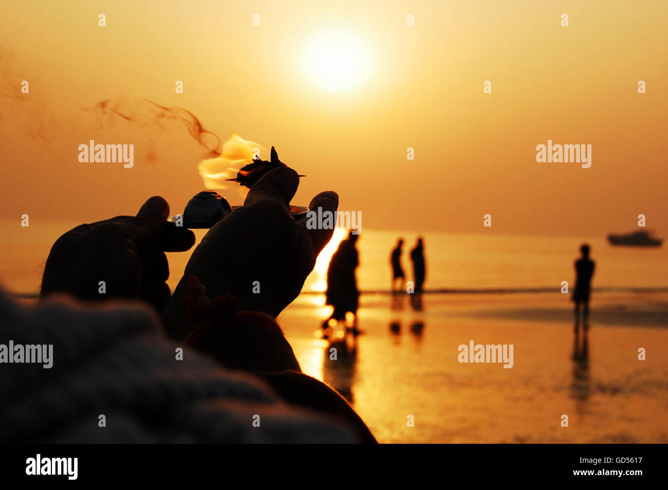 Religious offering at a beach Stock Photo - Alamy