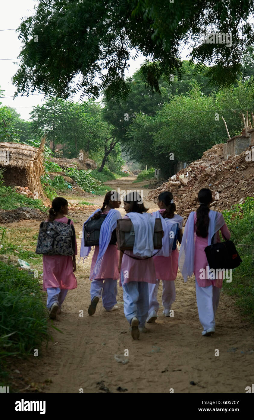 Young girls going to school Stock Photo - Alamy