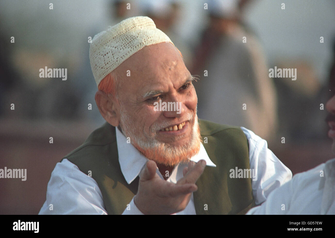 Man greeting friends Stock Photo - Alamy
