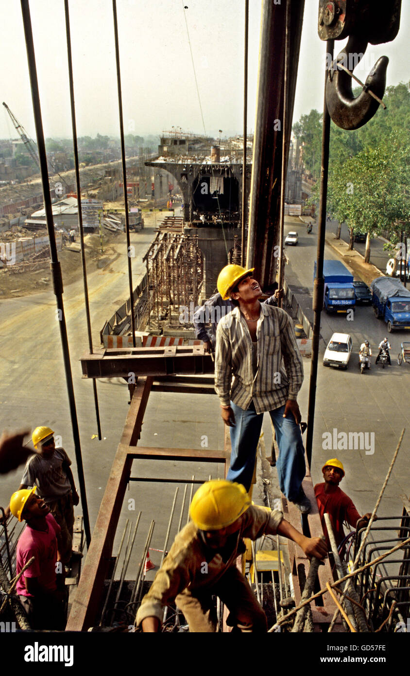 Men working at the construction site Stock Photo - Alamy