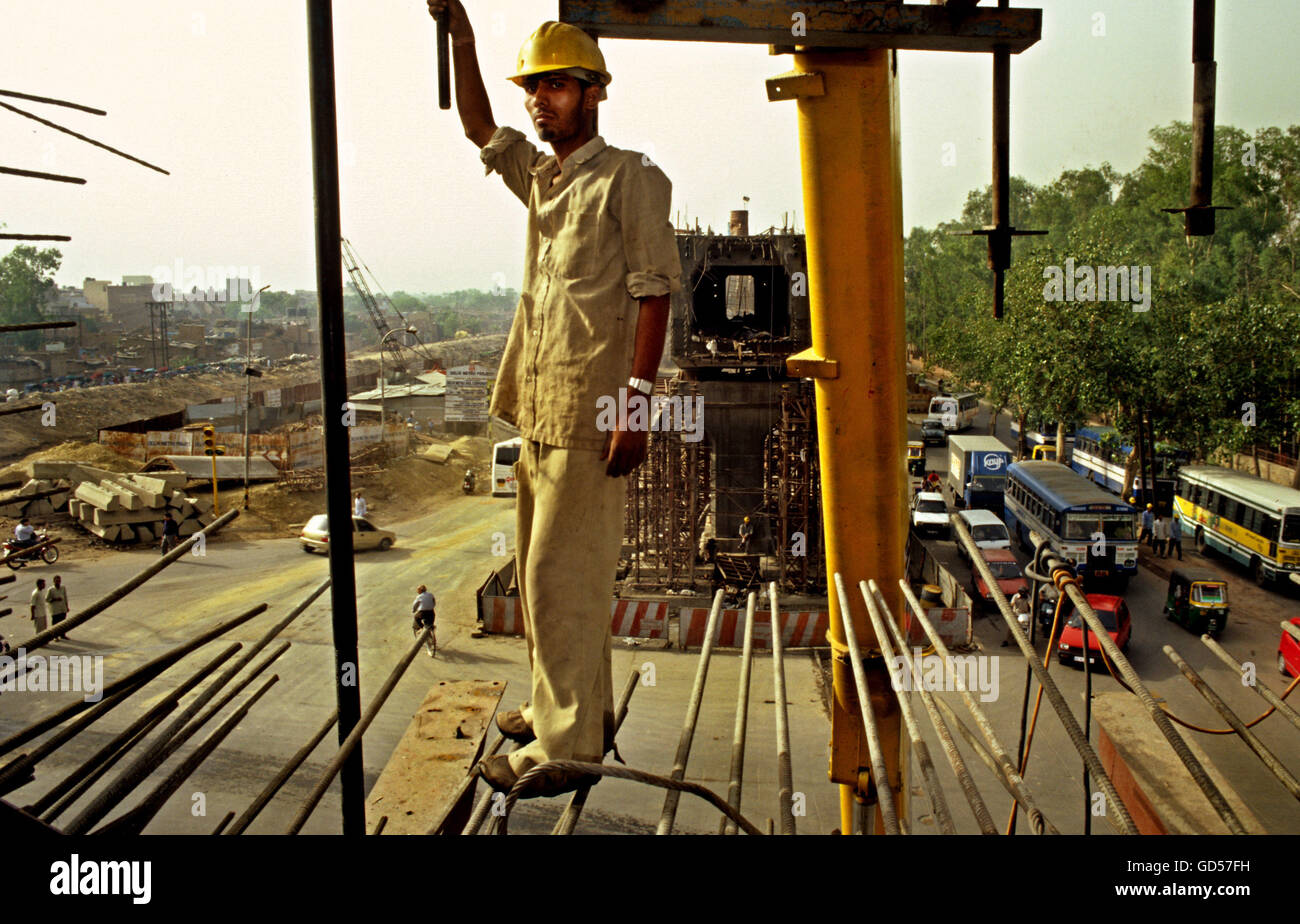 Man working at the construction site Stock Photo - Alamy