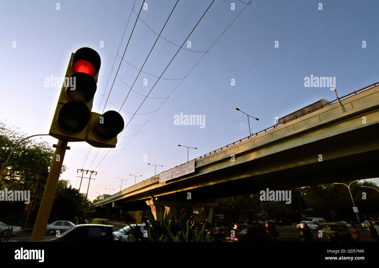 Traffic light with a flyover in the background Stock Photo - Alamy