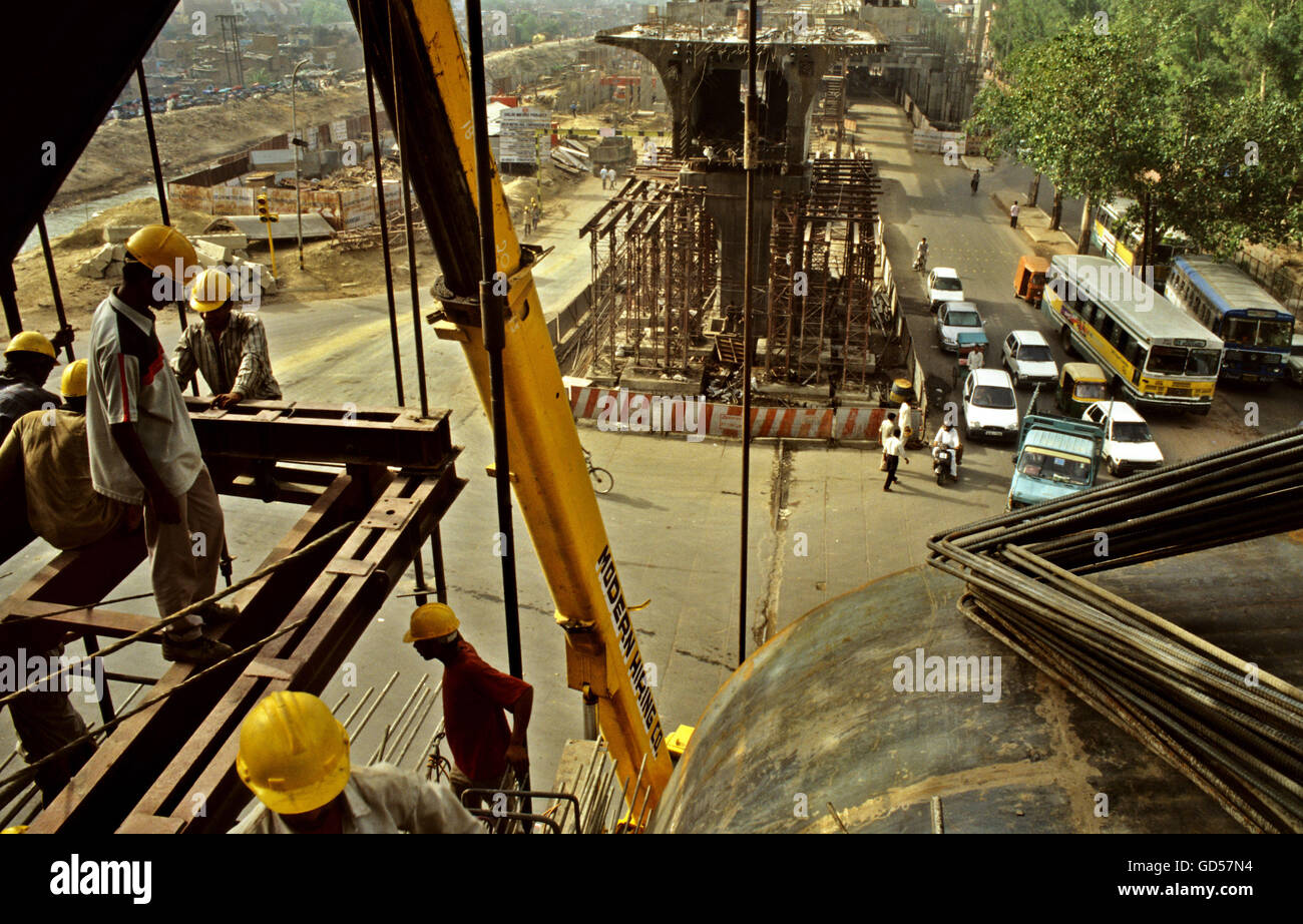 Men working at the construction site Stock Photo - Alamy