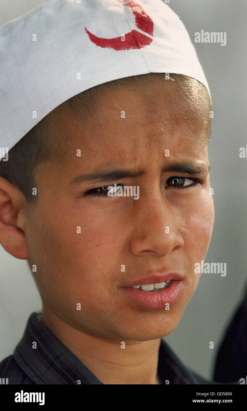 A boy in Red Cross procession Stock Photo - Alamy