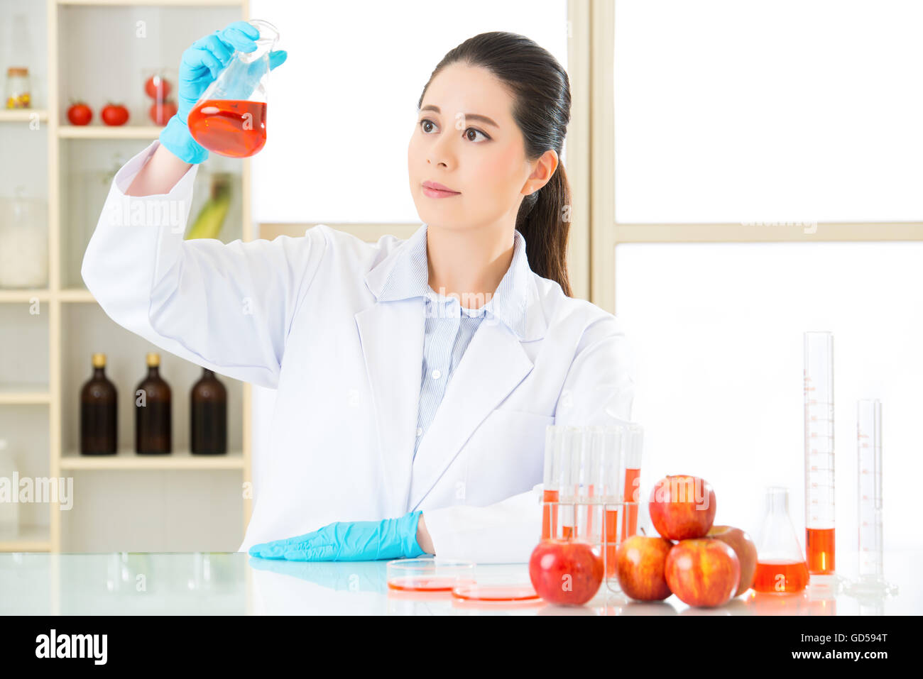 female scientist looking for new genetic modification in laboratory ...
