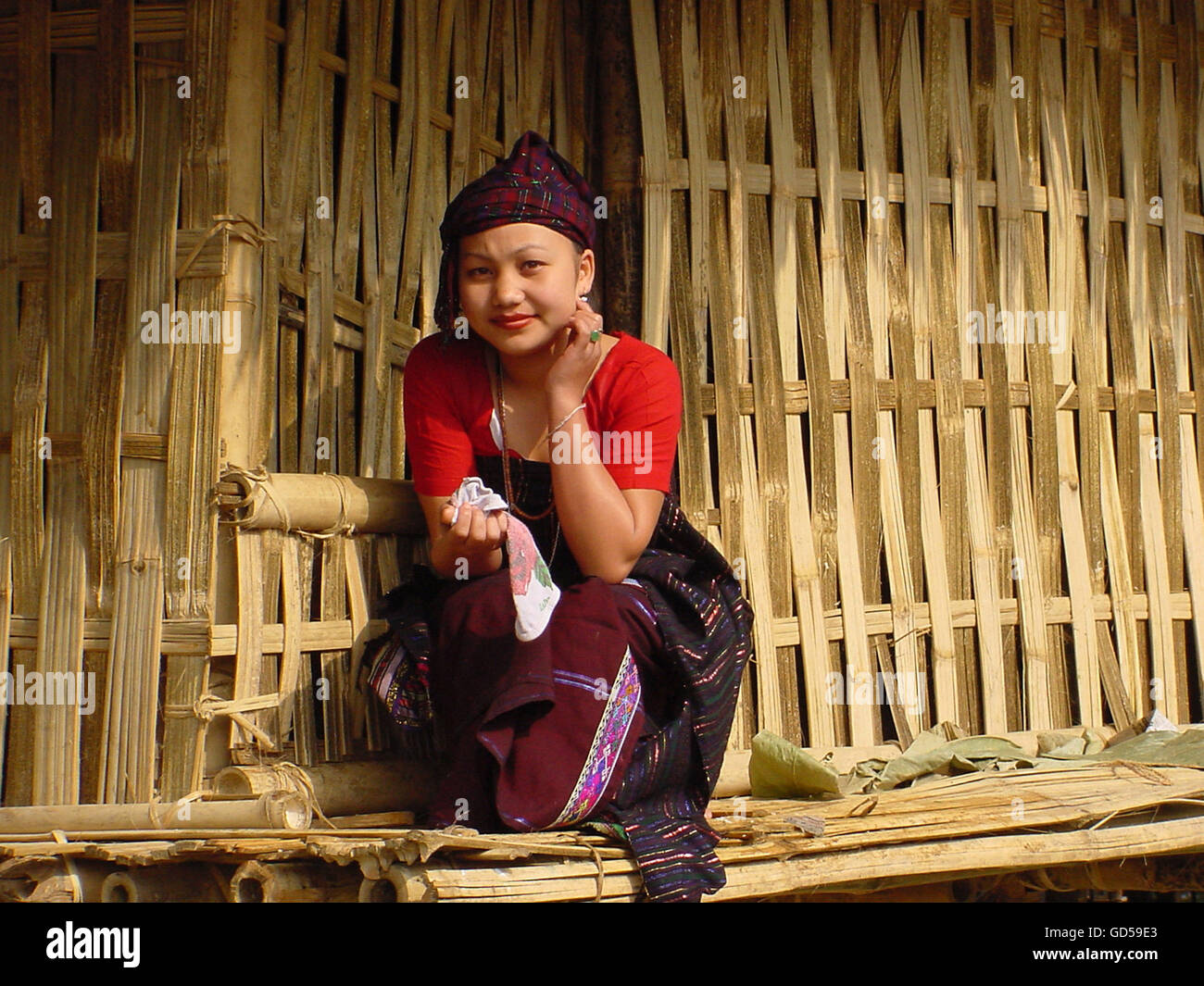 Woman outside her house Stock Photo - Alamy
