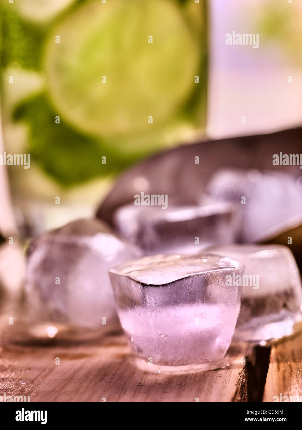 Chunks of ice cubes alcohol drink background on wooden boards Stock ...