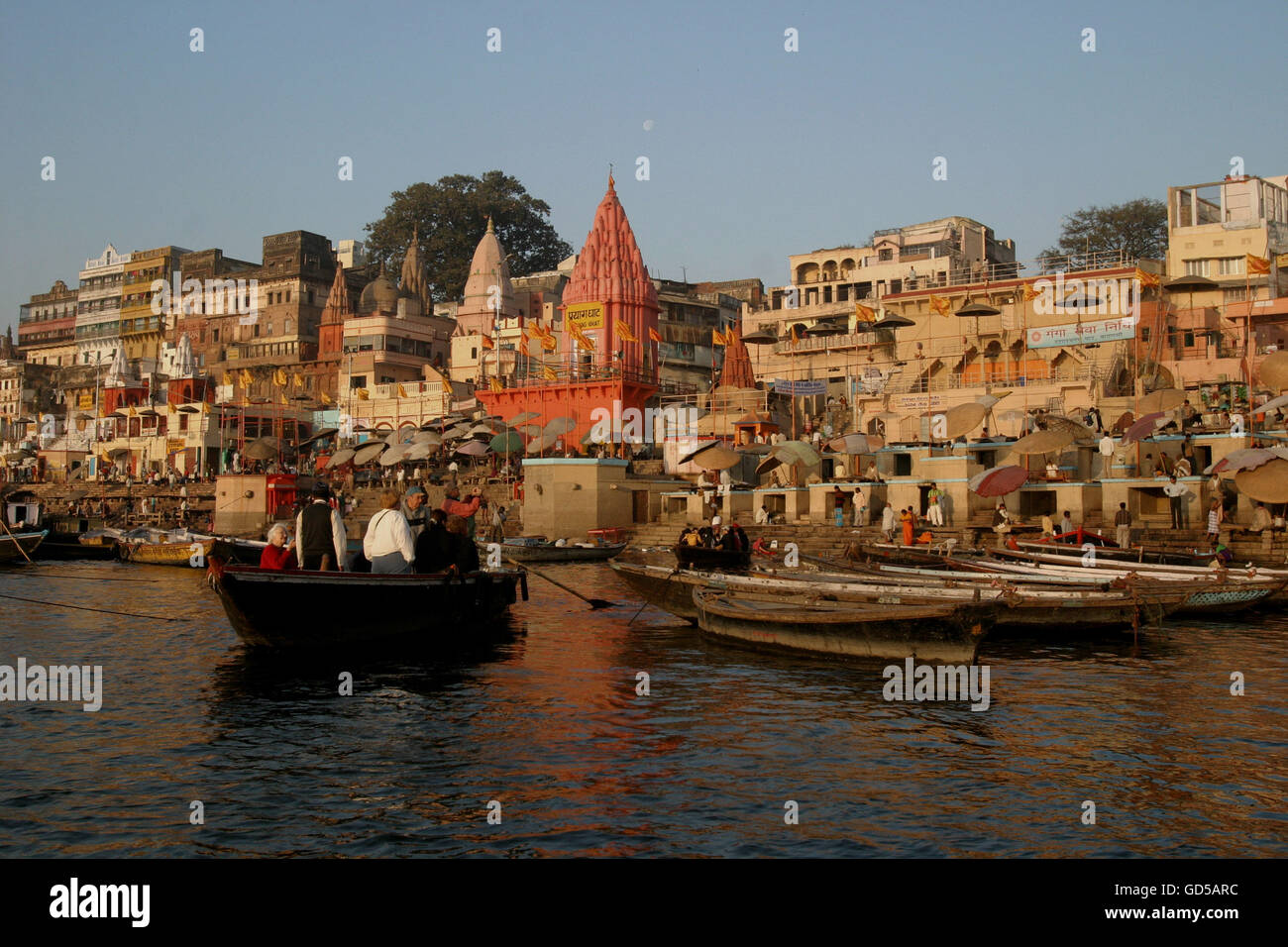 Boat at the ghats Stock Photo - Alamy