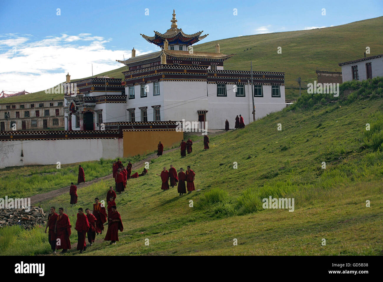 Monks near monastery Stock Photo - Alamy