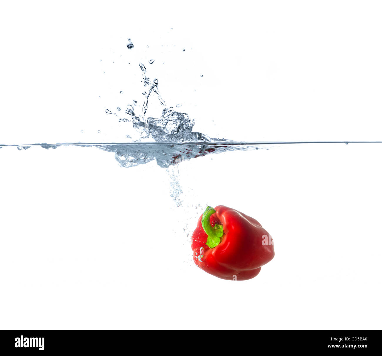 Red Paprika Sinking in Water Isolated on White Background Stock Photo ...
