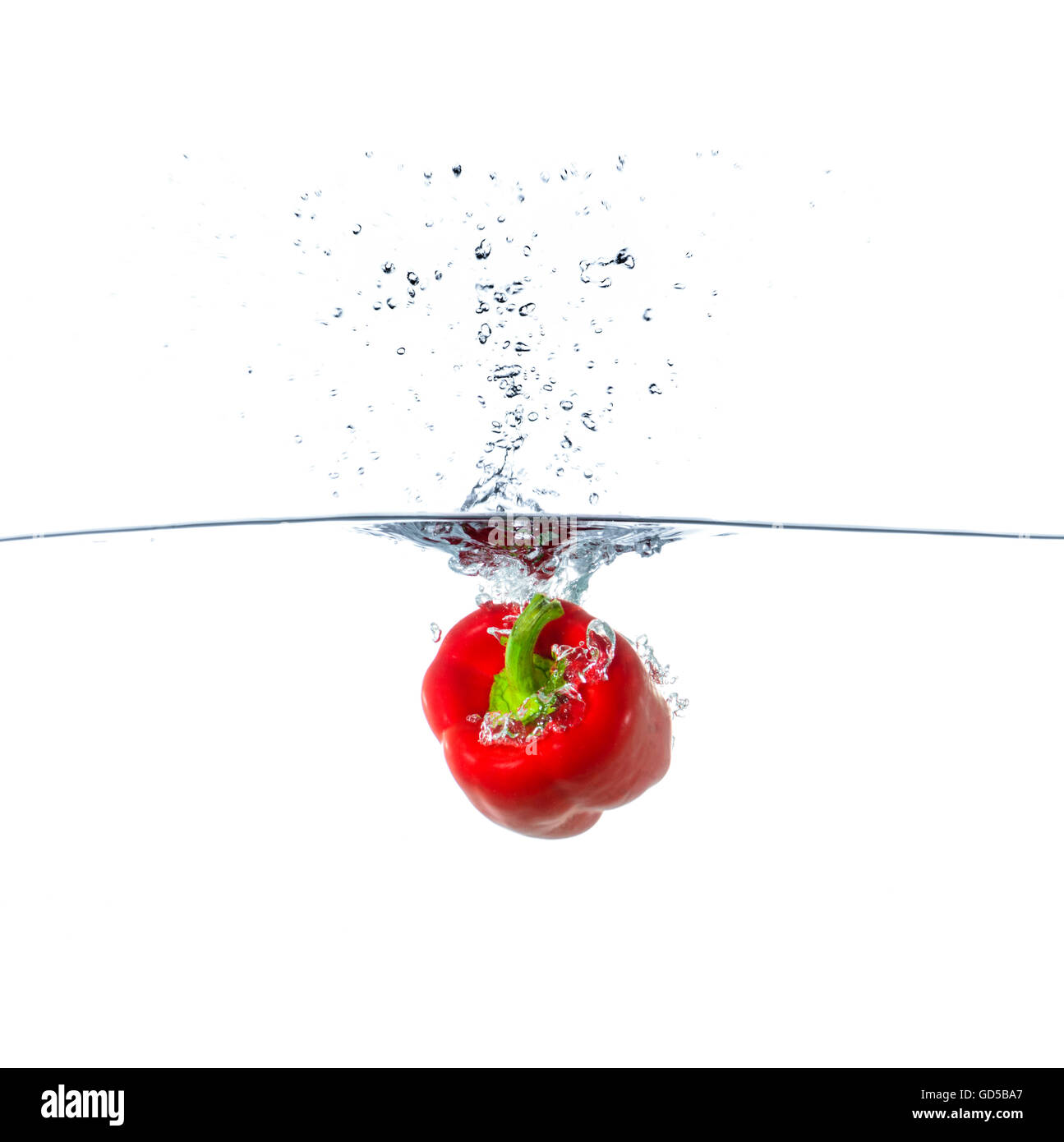 Fresh Red Paprika Sinking in Water Isolated on White Background Stock ...