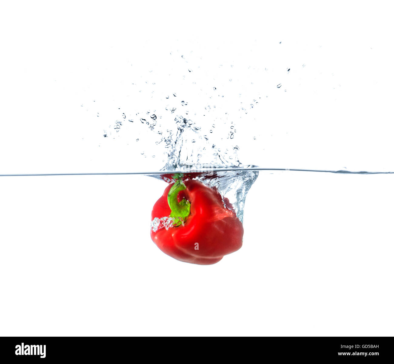 Red Paprika Falling in Water Isolated on White Background Stock Photo ...