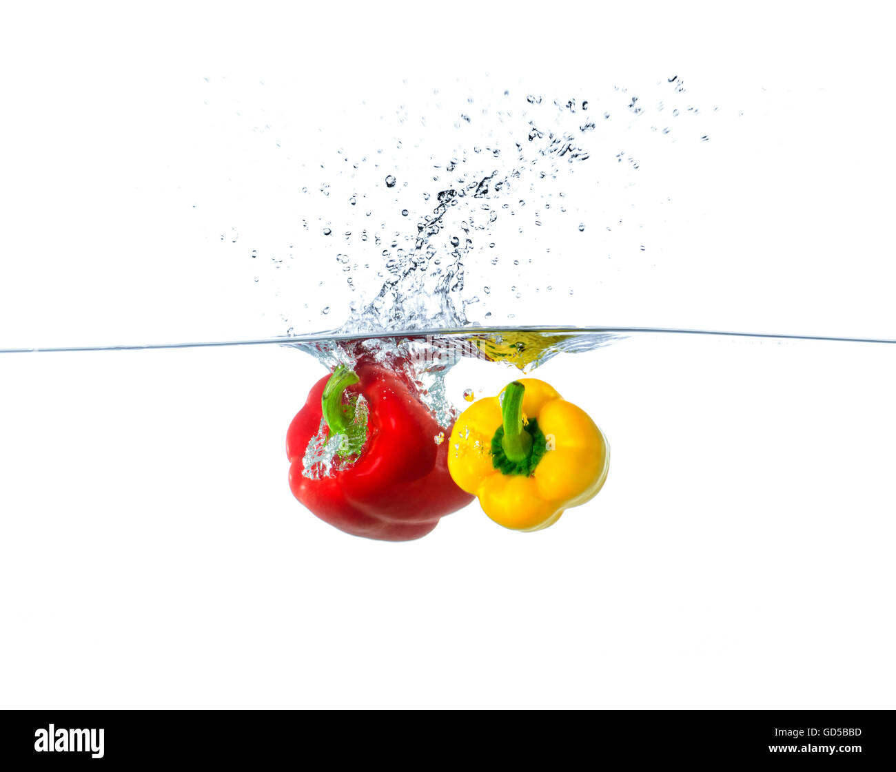 Fresh Red and Yellow Paprika Splash in Water Isolated on White ...