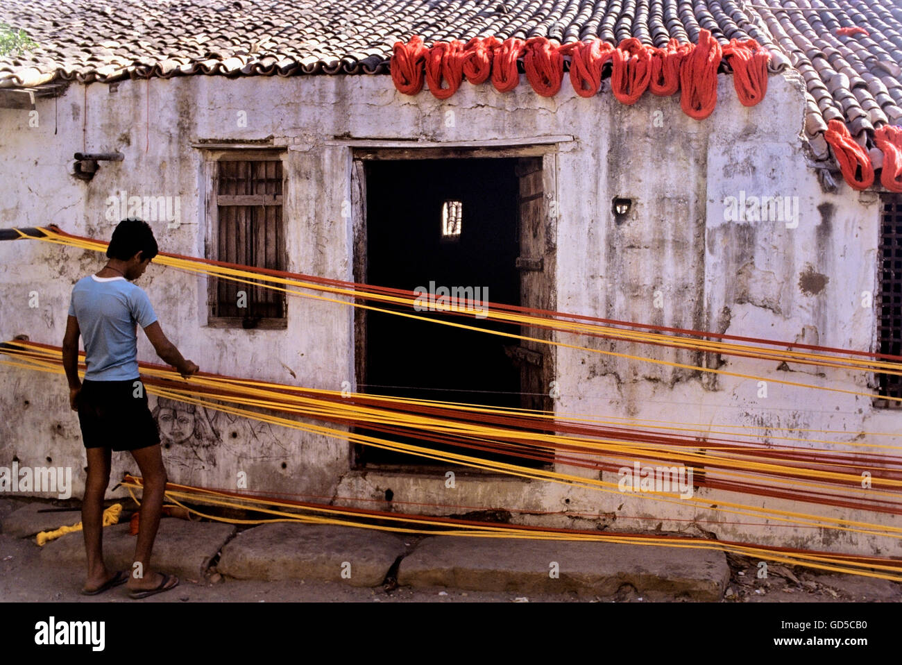 Drying dyed yarn Stock Photo - Alamy