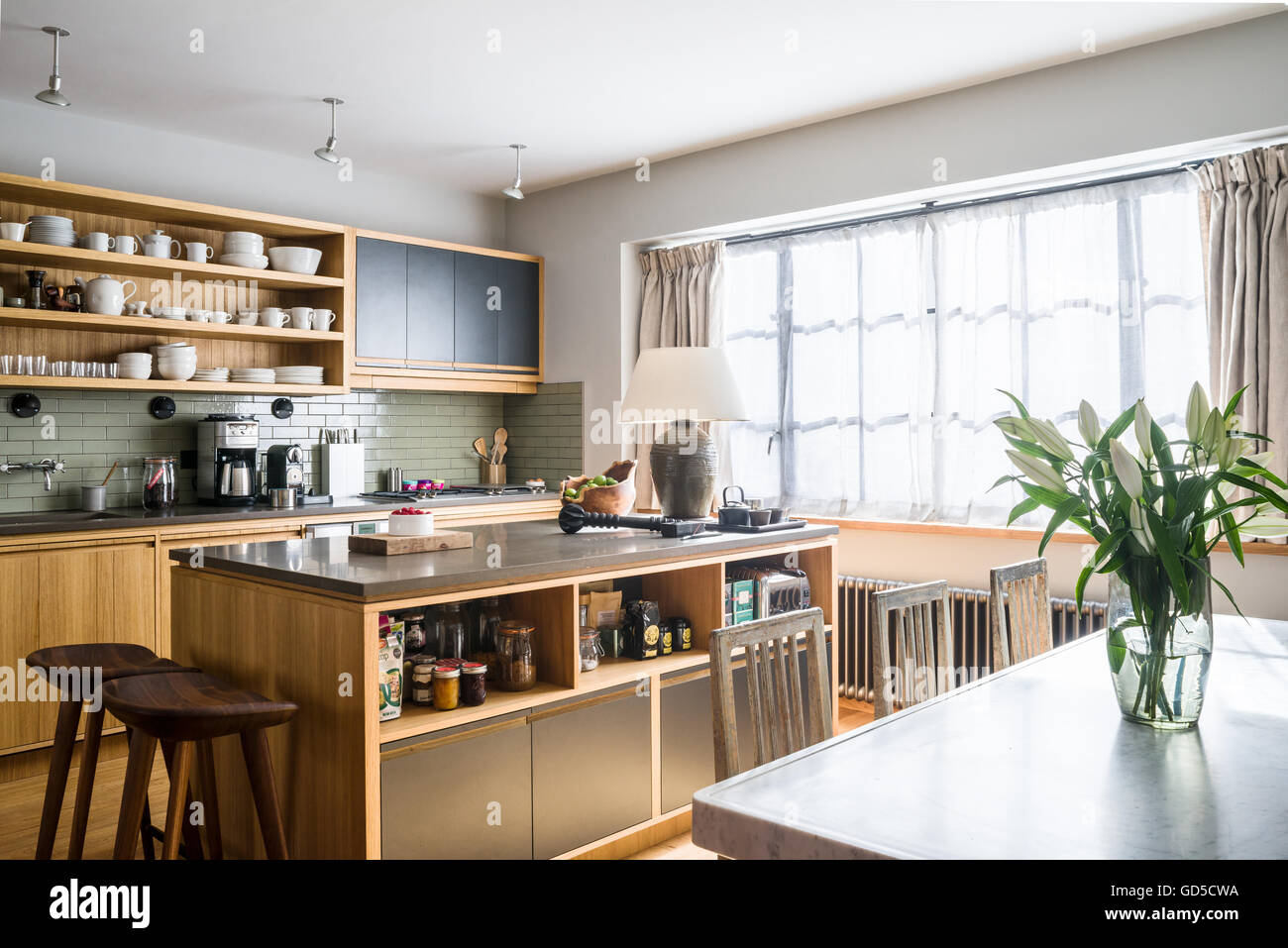 Open plan kitchen with oak units by Bohemian Works and Silestone ...
