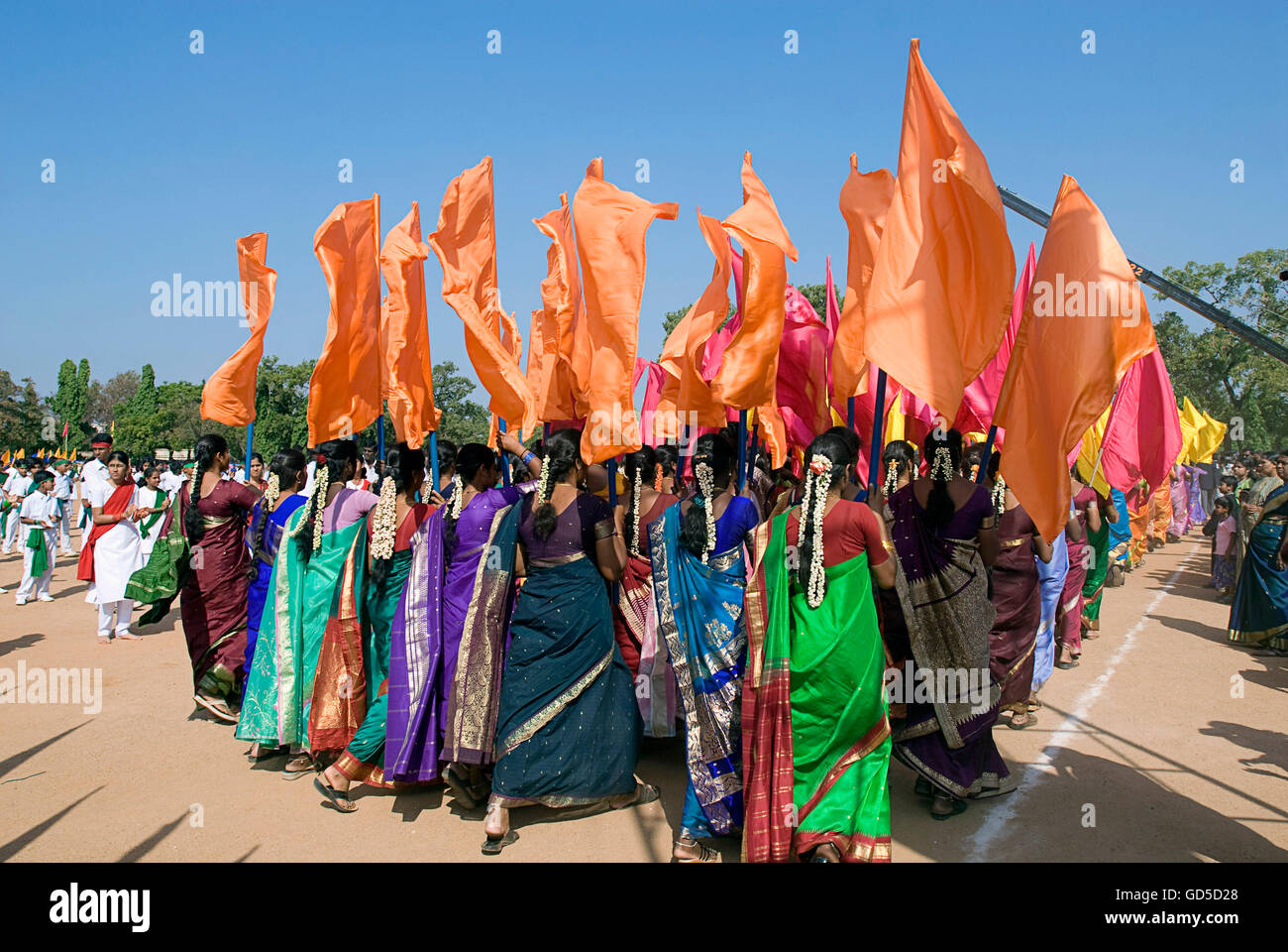 Women carrying flags Stock Photo - Alamy