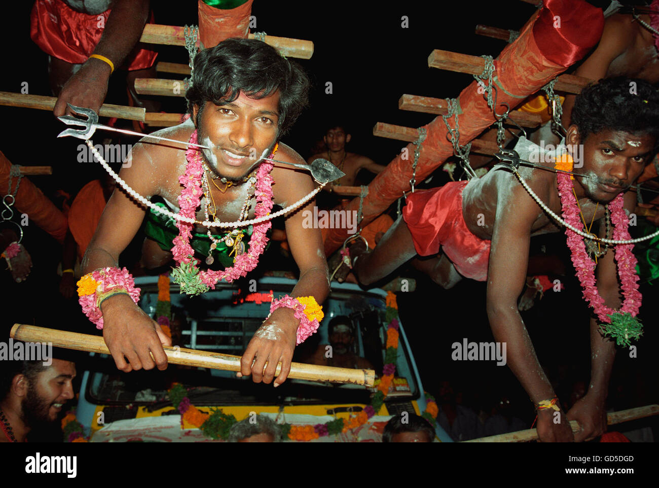 Man suspended by hooks hi-res stock photography and images - Alamy