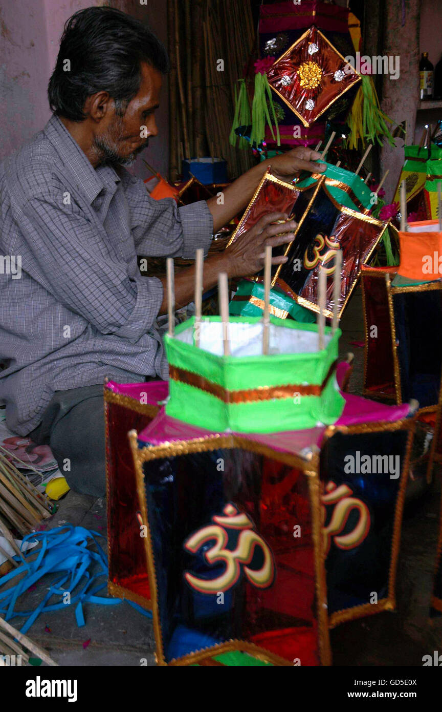 Man making paper lanterns Stock Photo - Alamy