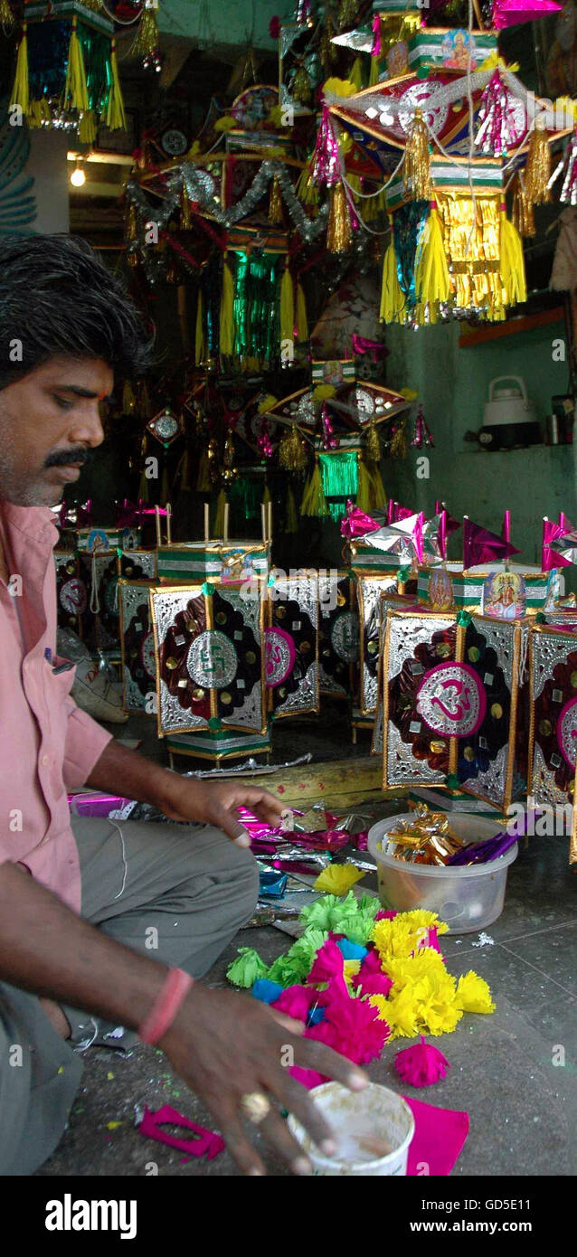 Man making paper lanterns Stock Photo - Alamy
