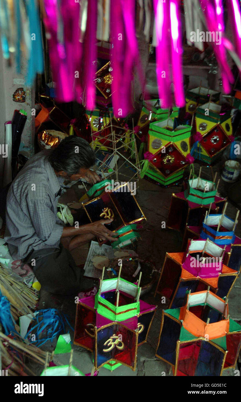 Man making paper lanterns Stock Photo - Alamy