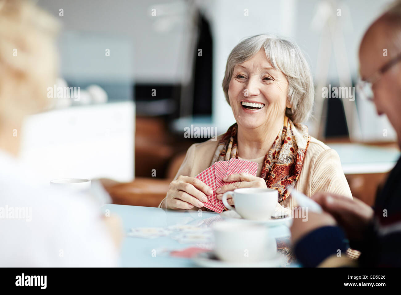 Gathering in cafe Stock Photo - Alamy