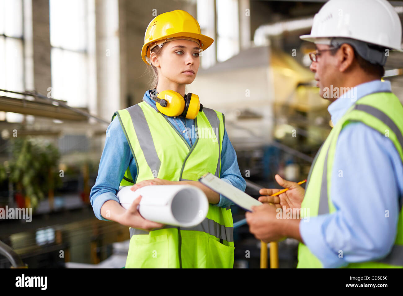 Interaction of engineers Stock Photo - Alamy