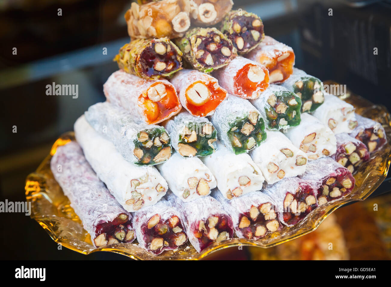 Assortment of Turkish delight on the counter. Traditional cuisines of ...