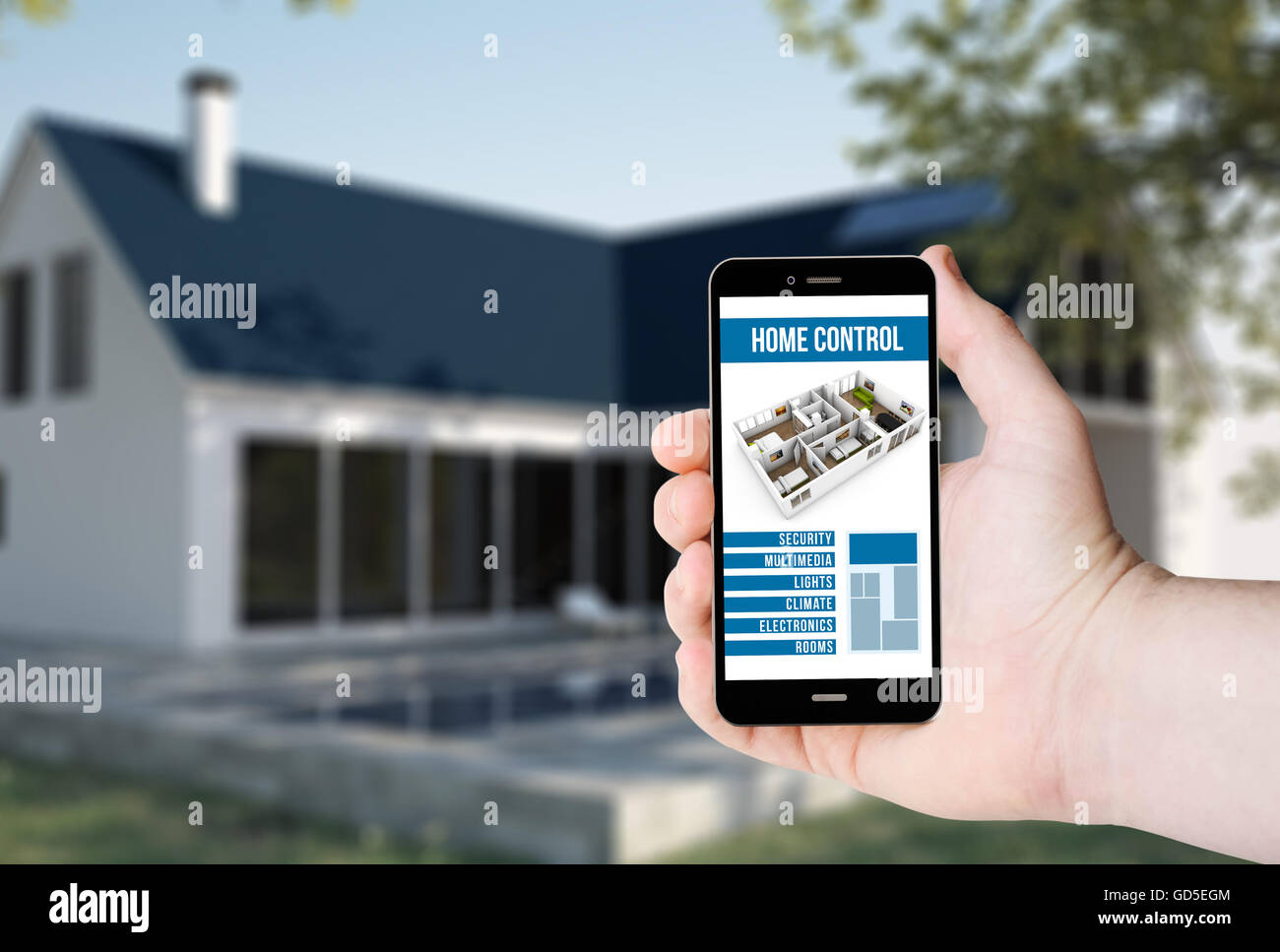 Hand hold a phone with remote home control app on a screen on the ...