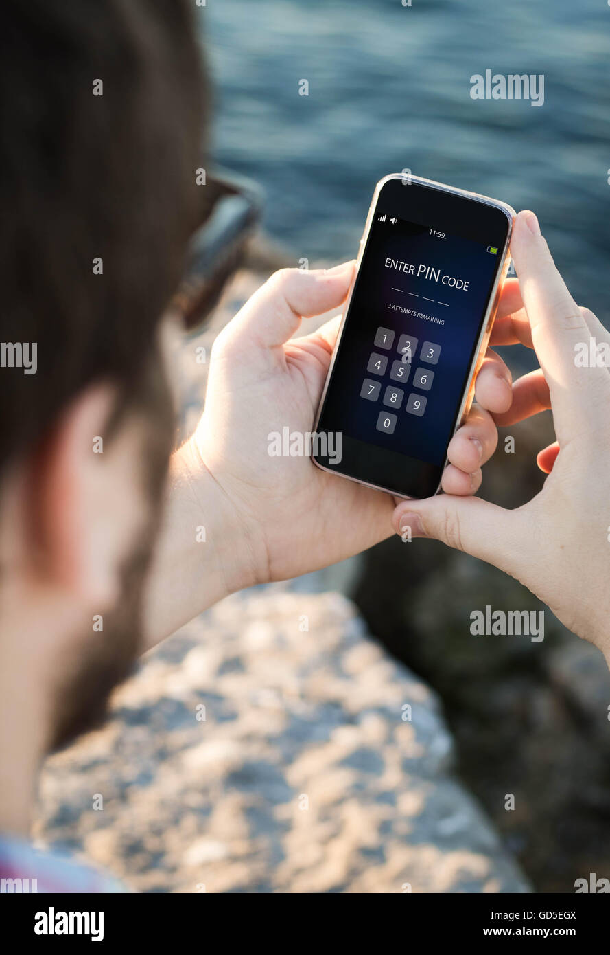 Hand holding smartphone entering password hi-res stock photography and ...