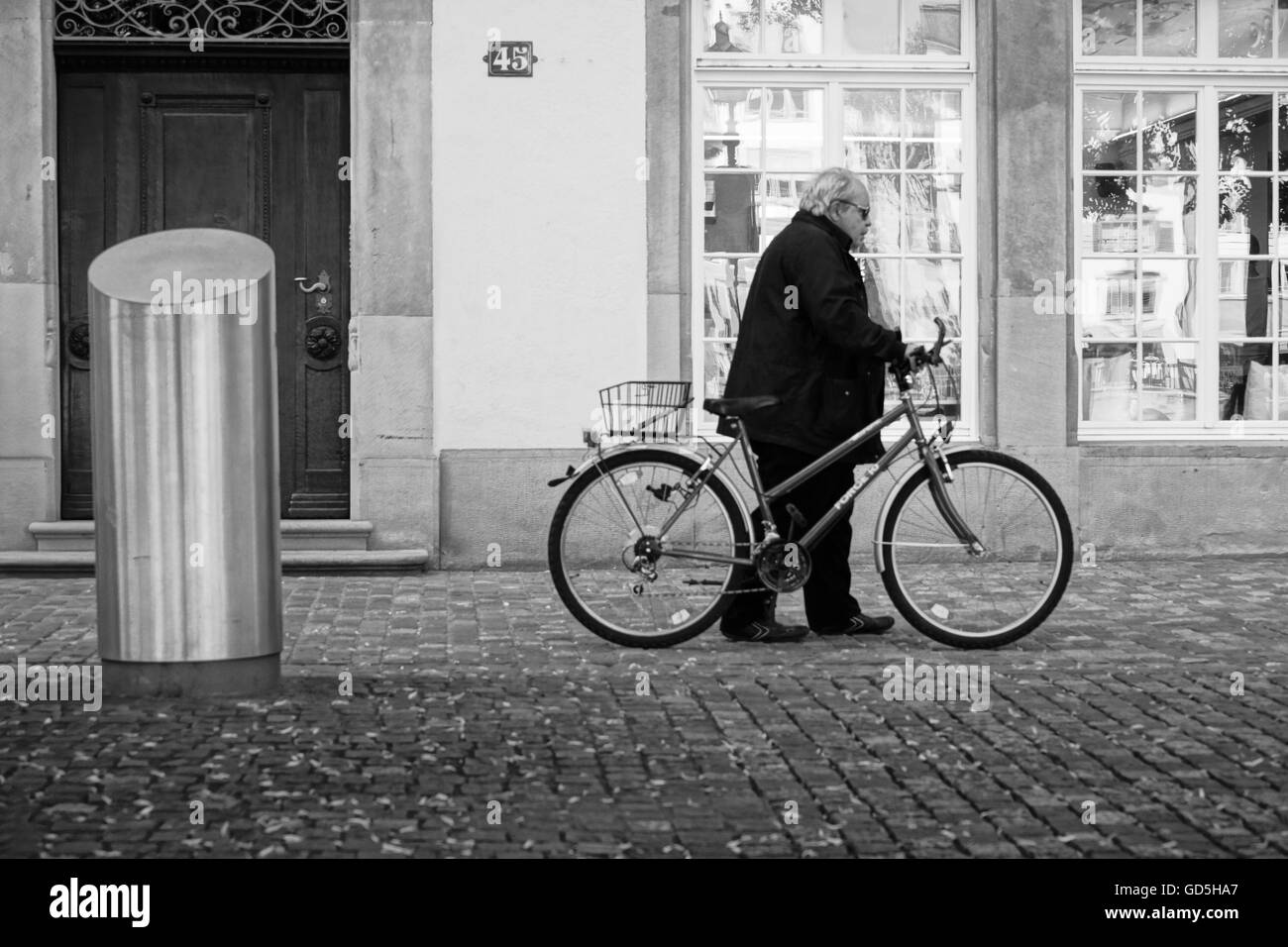 Old man with bicycle in zurich, switzerland, europe Stock Photo - Alamy