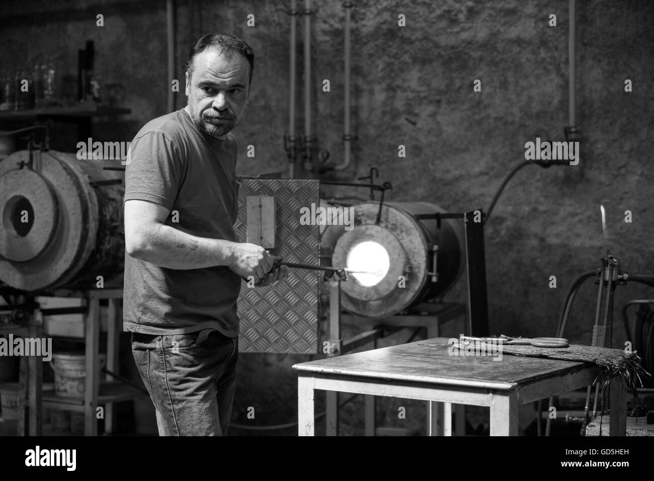 Glass artist craftsman Black and White Stock Photos & Images - Alamy