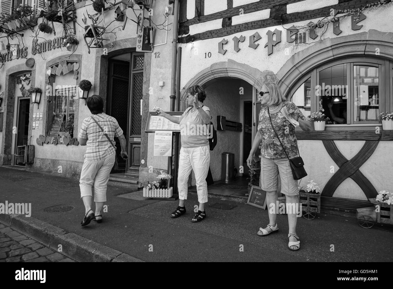 People going in different directions hi-res stock photography and ...