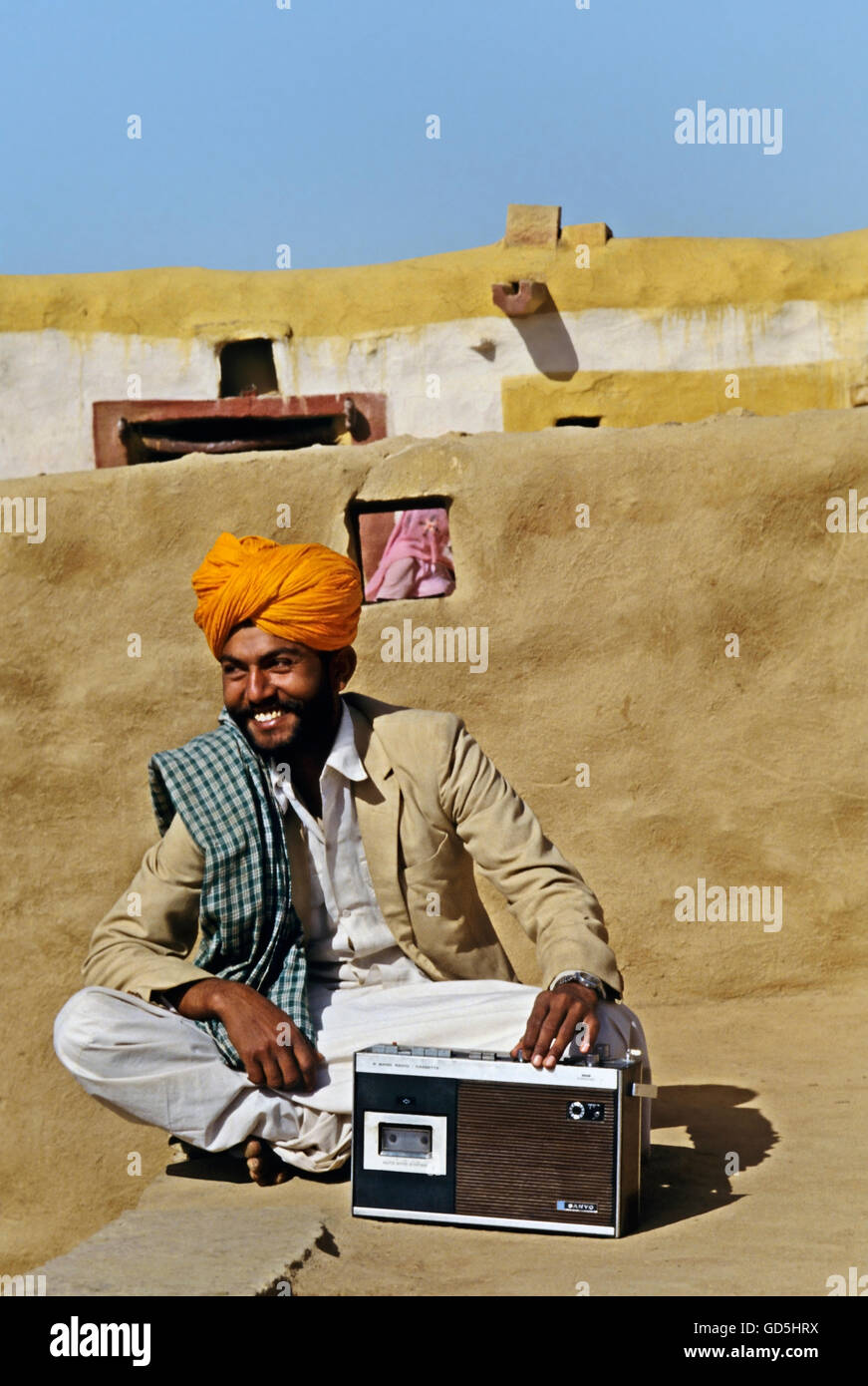 Man listening to radio Stock Photo - Alamy