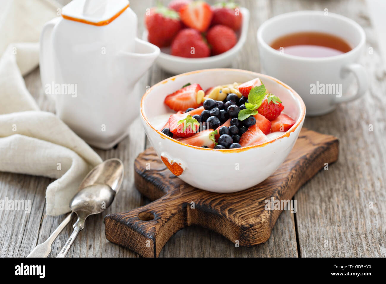 Greek yogurt bowl with fresh berries and nuts Stock Photo - Alamy