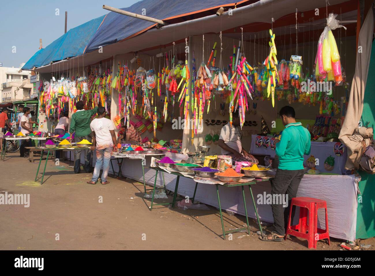 Dry colours and pichkari stall, holi festival, puri, orissa, india ...