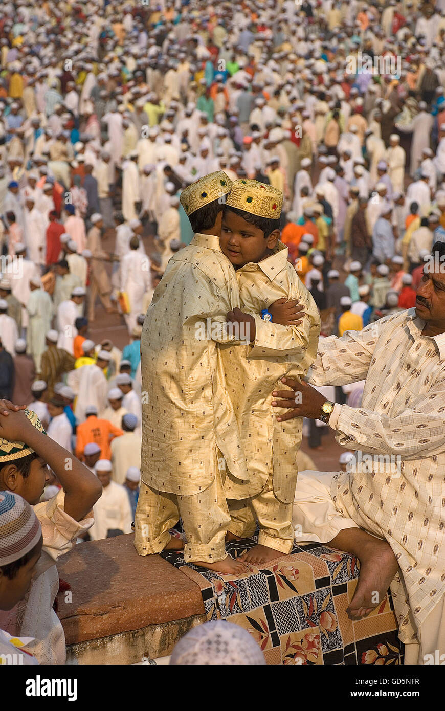 Children wishing each other during Id Stock Photo - Alamy