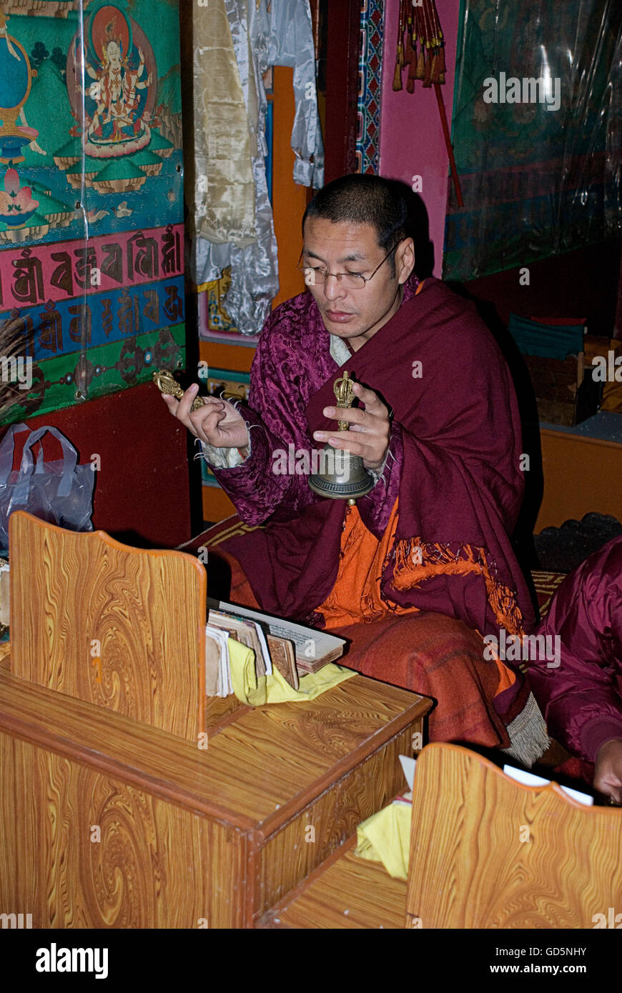 Monk offering prayers Stock Photo - Alamy