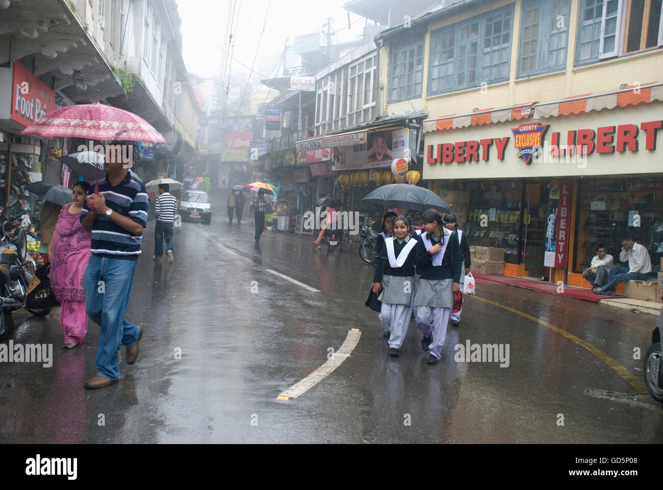 People on a rainy day Stock Photo - Alamy